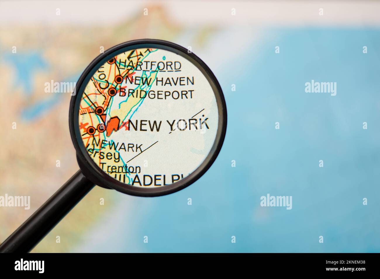 map under magnifying glass - New York Stock Photo - Alamy