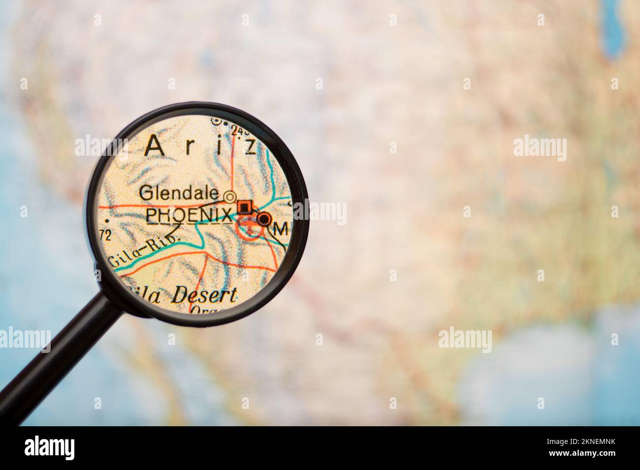Globe under magnifying glass hi-res stock photography and images - Alamy