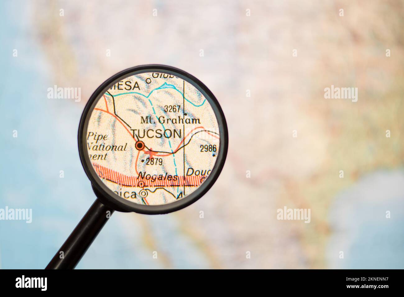 map under magnifying glass - Tucson Stock Photo - Alamy