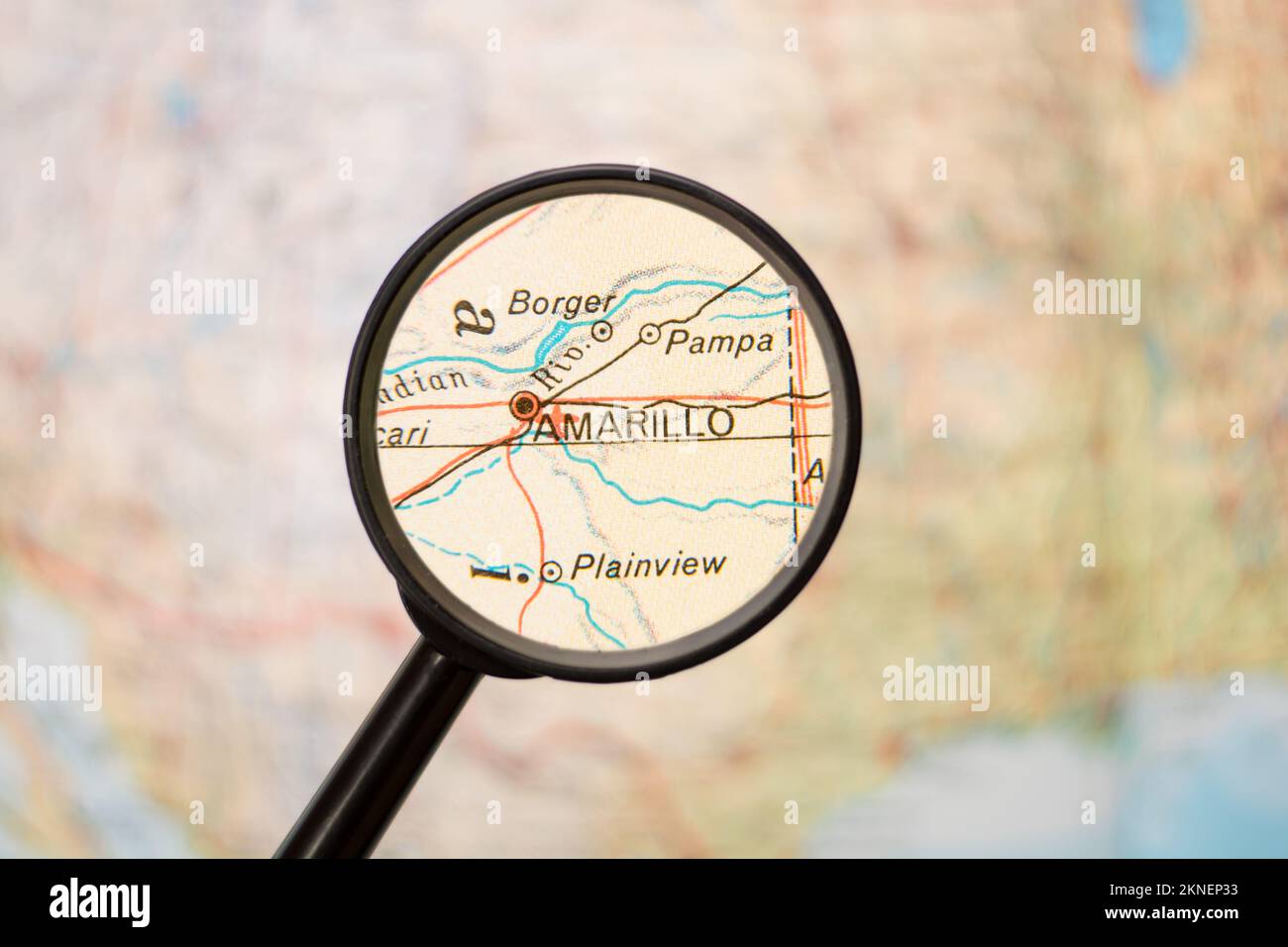 map under magnifying glass - Amarillo Stock Photo - Alamy