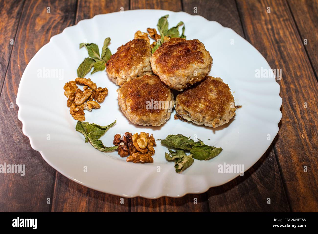 Minced pork chops fried in a pan Stock Photo - Alamy