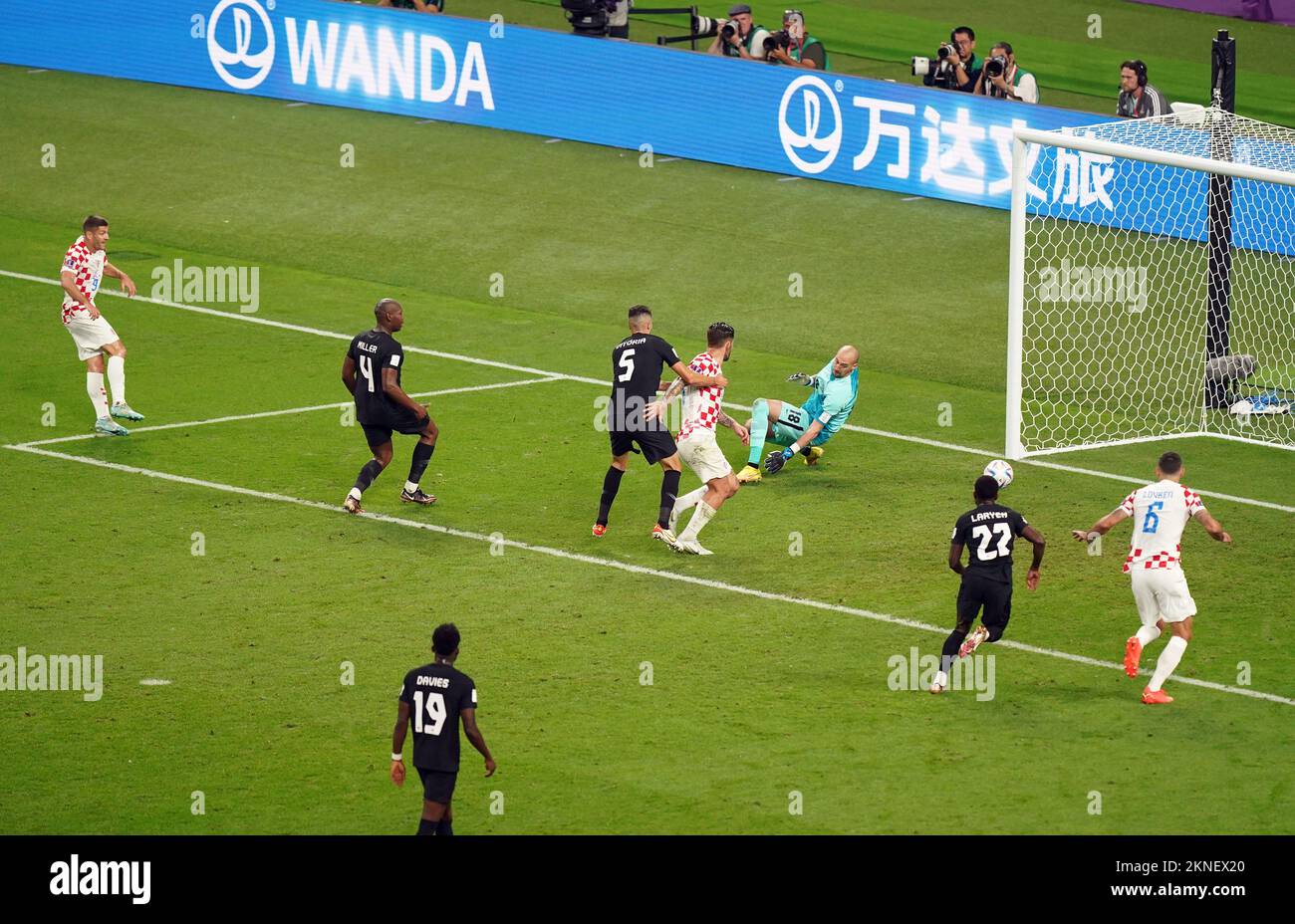 Croatia's Andrej Kramaric (left) scores the equalising goal to level ...