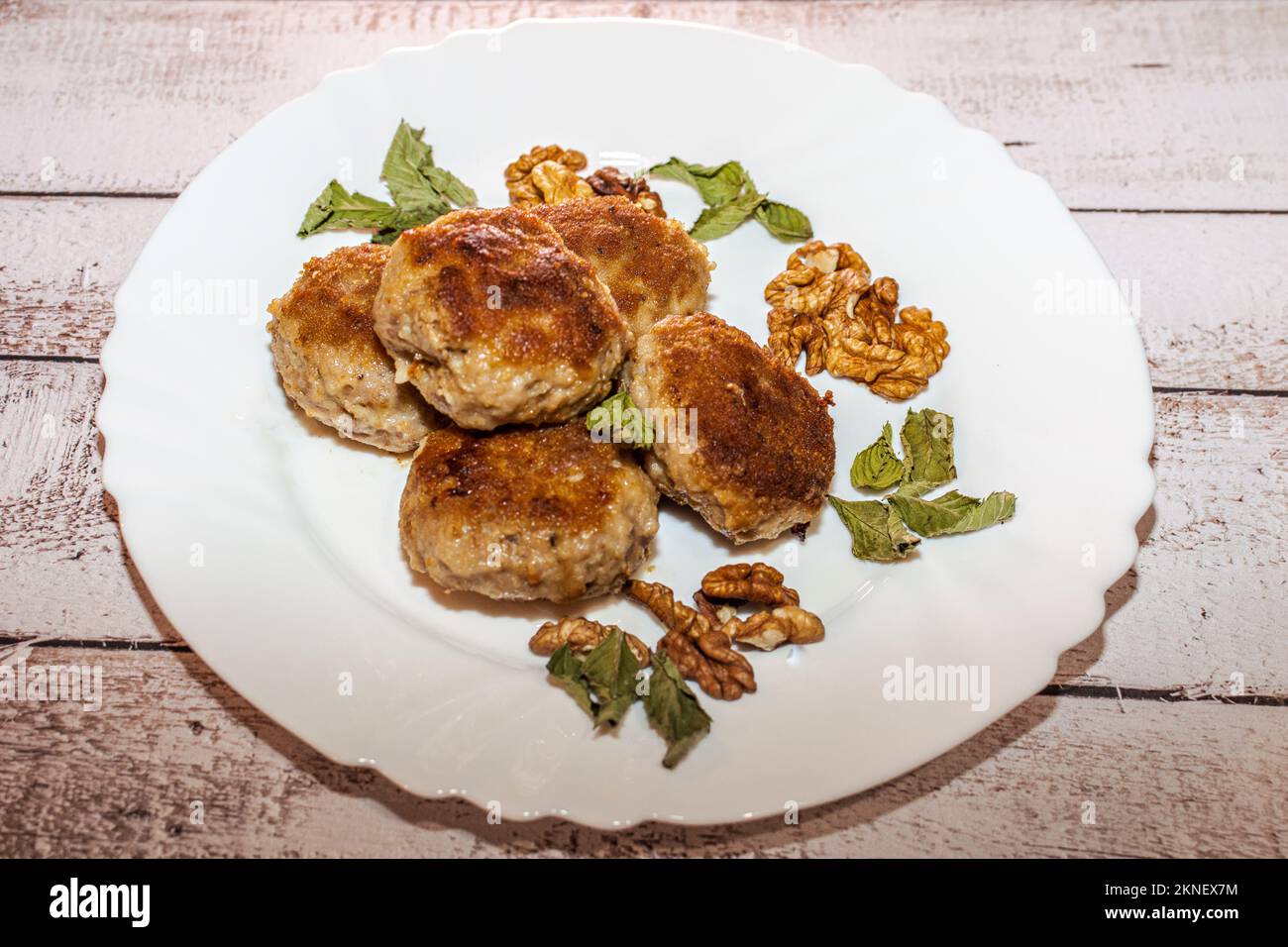 Minced pork chops fried in a pan Stock Photo - Alamy