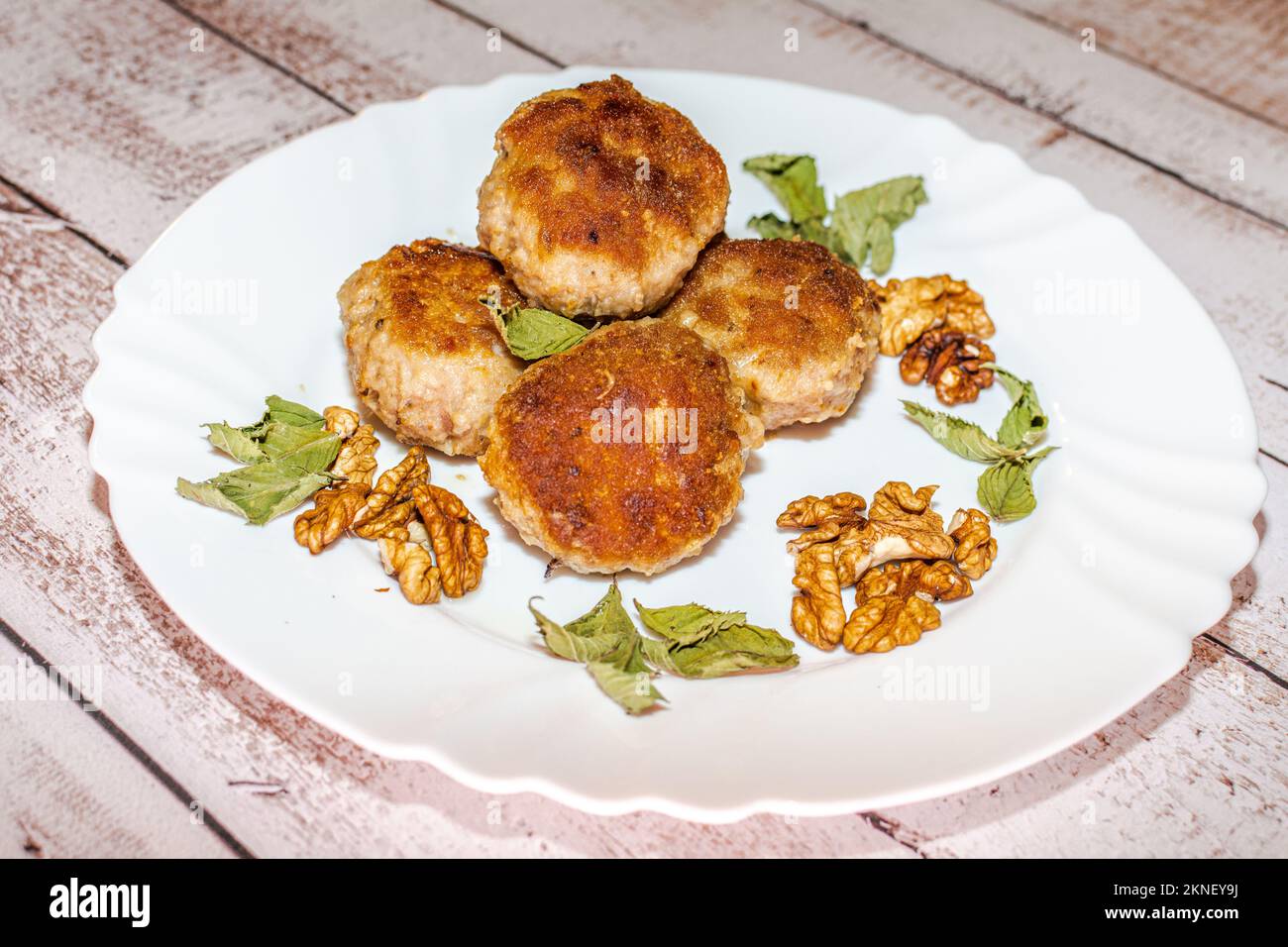 Minced pork chops fried in a pan Stock Photo - Alamy