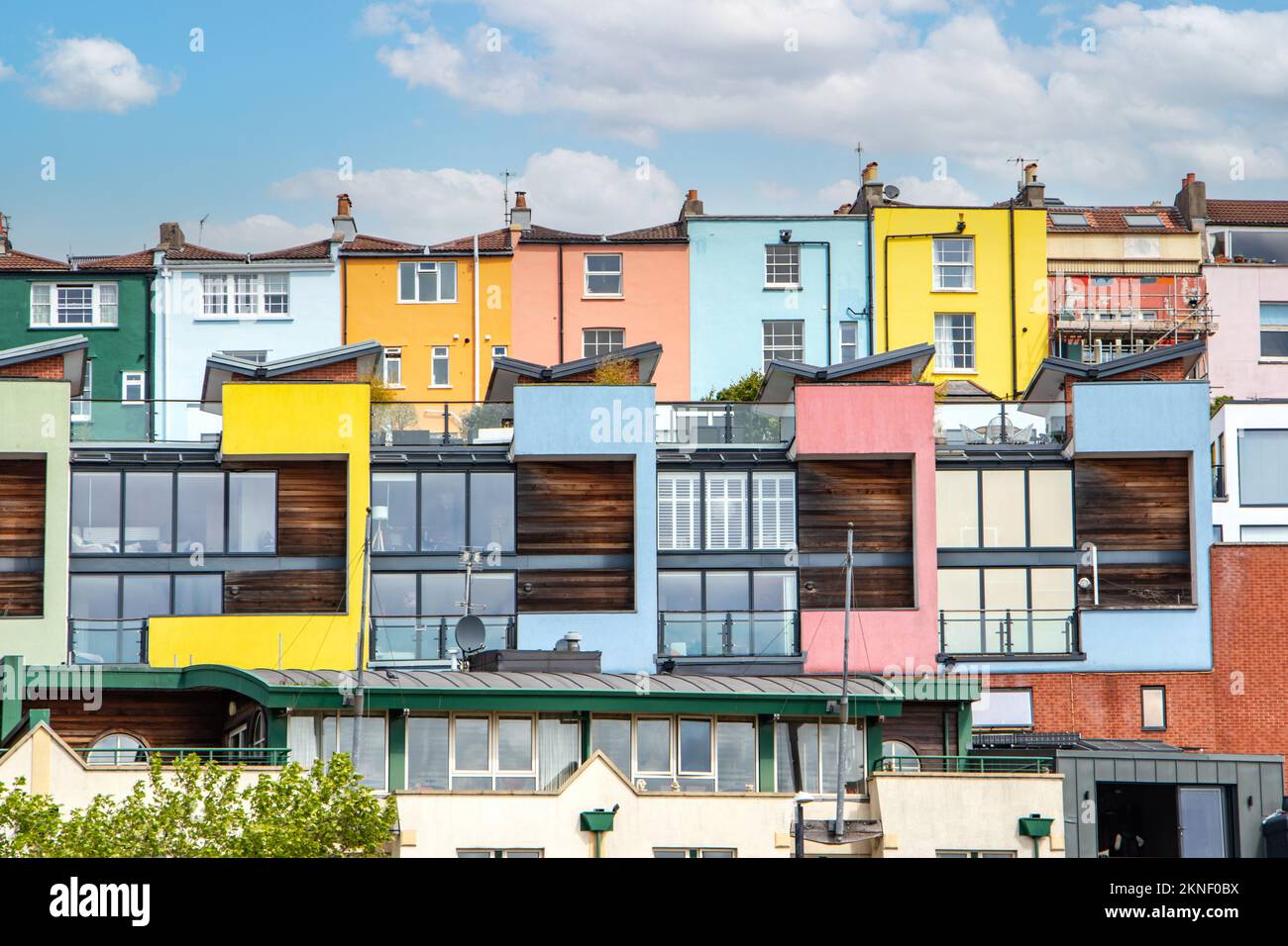 colourful painted houses by the waterside at Bristol Docks Stock Photo ...