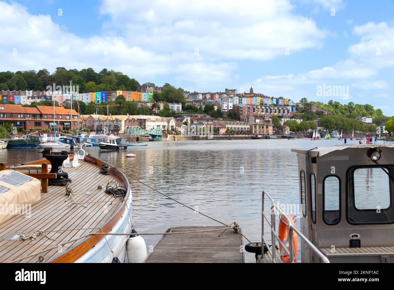 colourful painted houses by the waterside at Bristol Docks Stock Photo ...