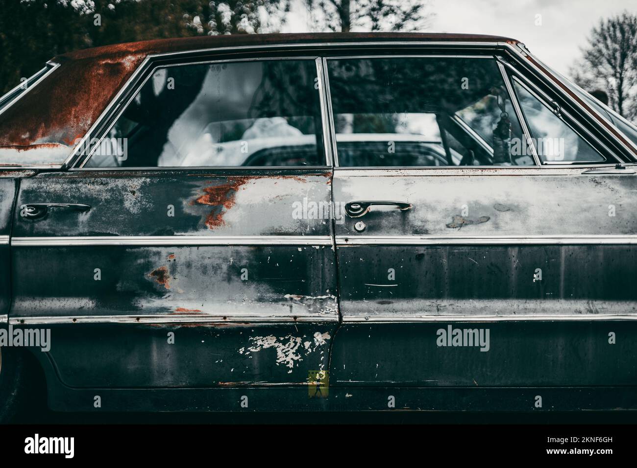 A shiny old black muscle car in the street Stock Photo - Alamy