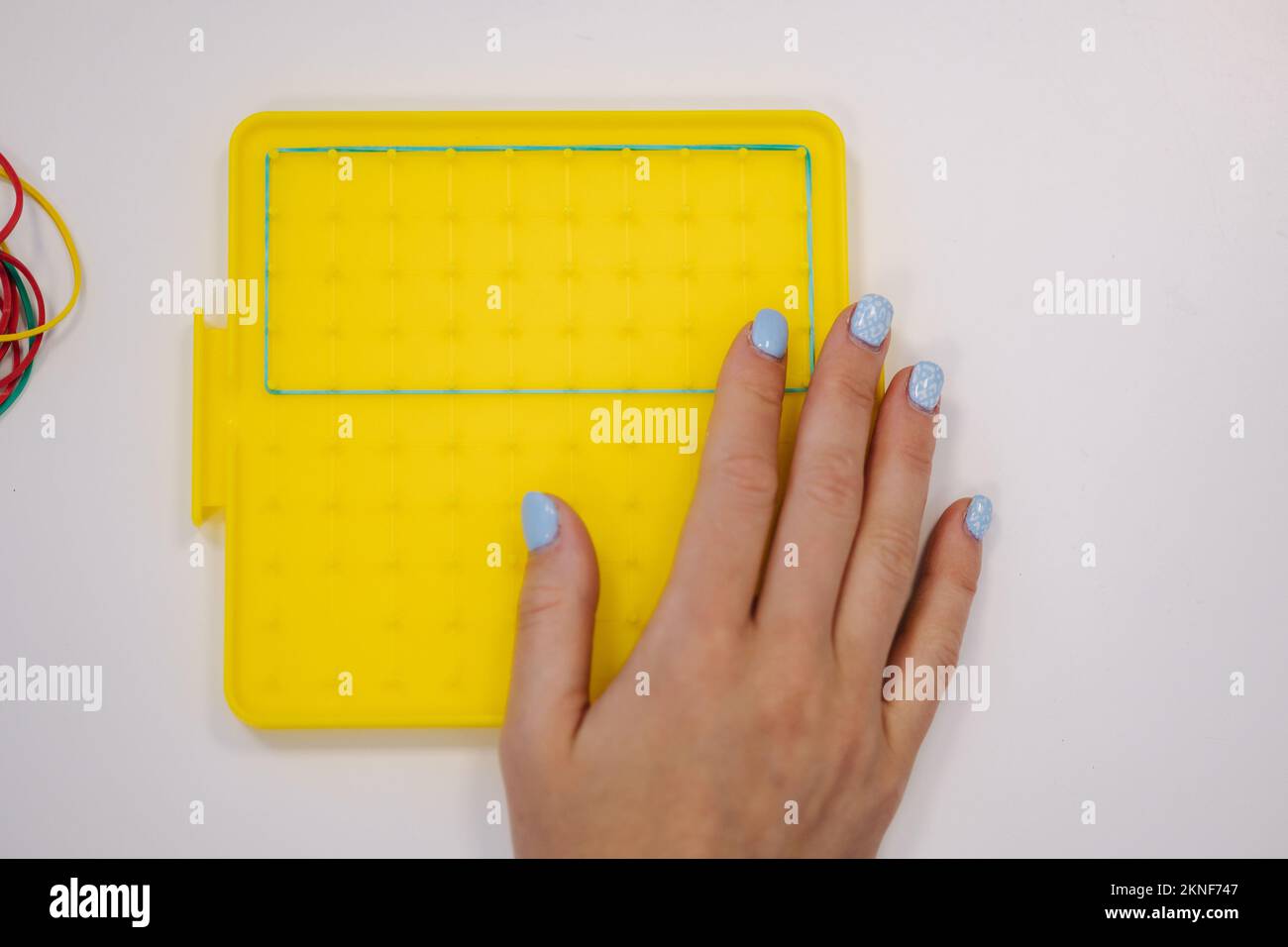 Educational games in kindergarden. Children play using rubber bands ...