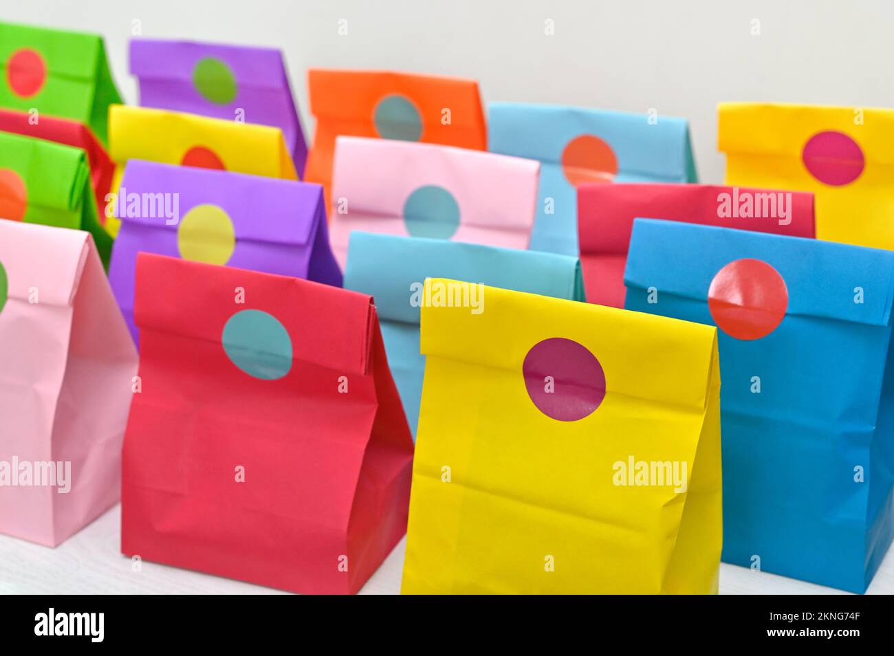 Set of colorful shopping folded paper bags on white background. Paper ...