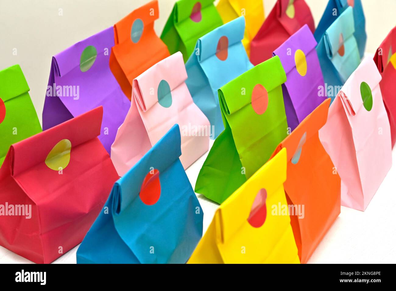 Set of colorful shopping folded paper bags on white background. Paper ...