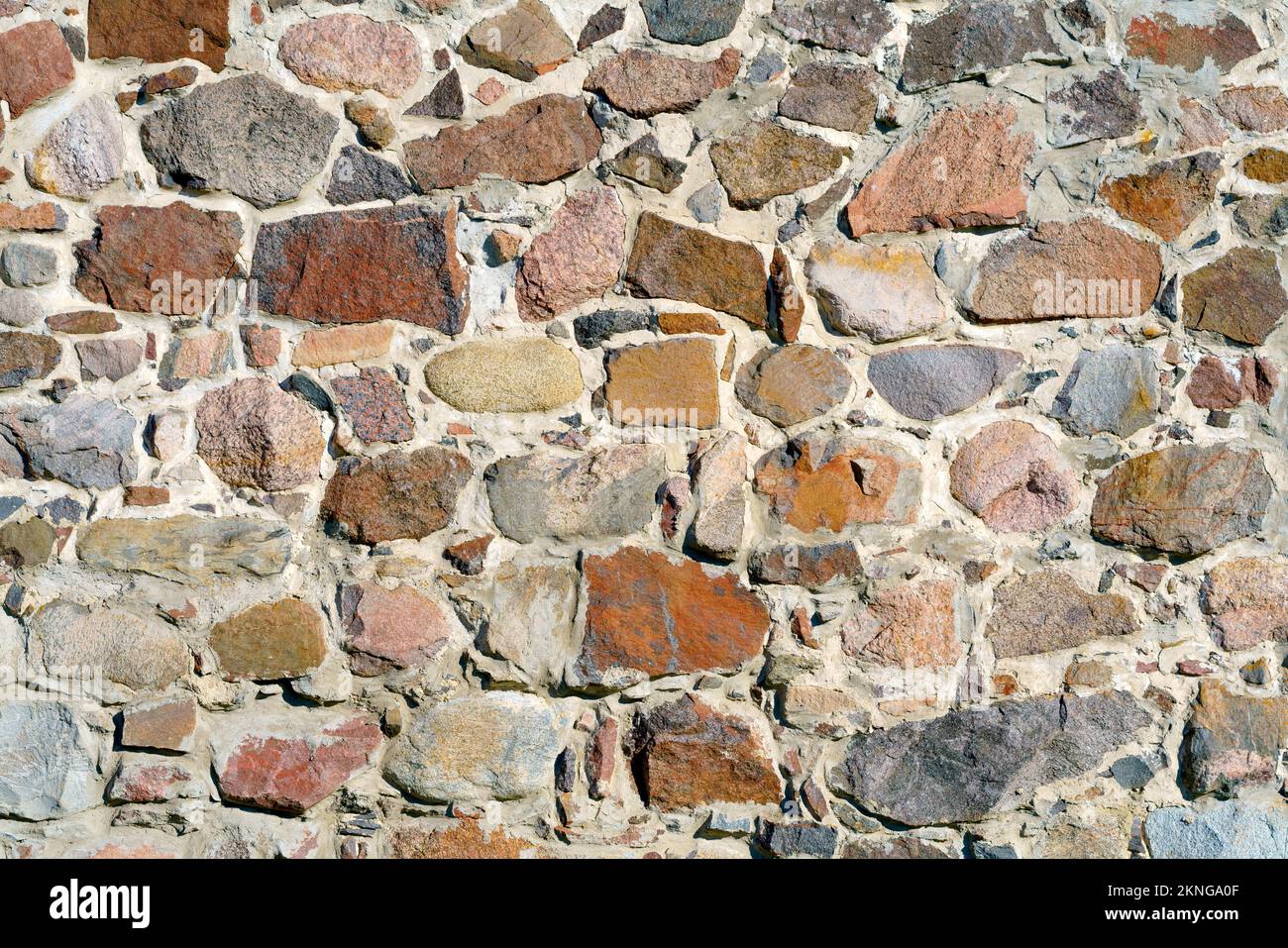 A wall of rough stones, Vintage building stone background Stock Photo ...