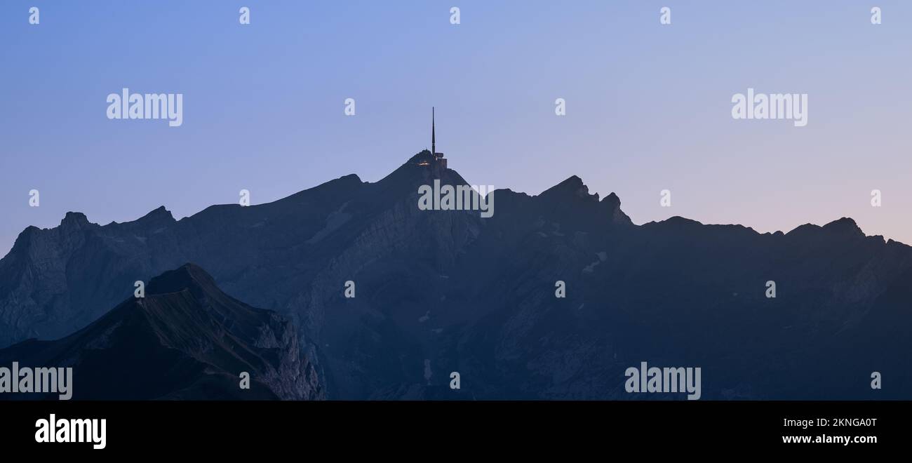 A panoramic sunset sky over the Alpstein mountains Appenzell Alps in ...