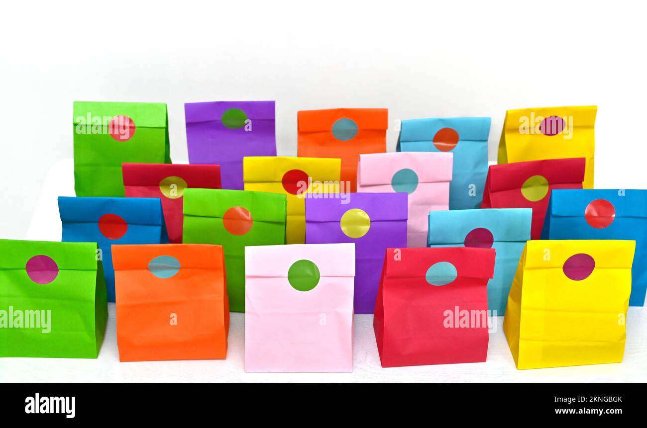 Set of colorful shopping folded paper bags on white background. Paper ...