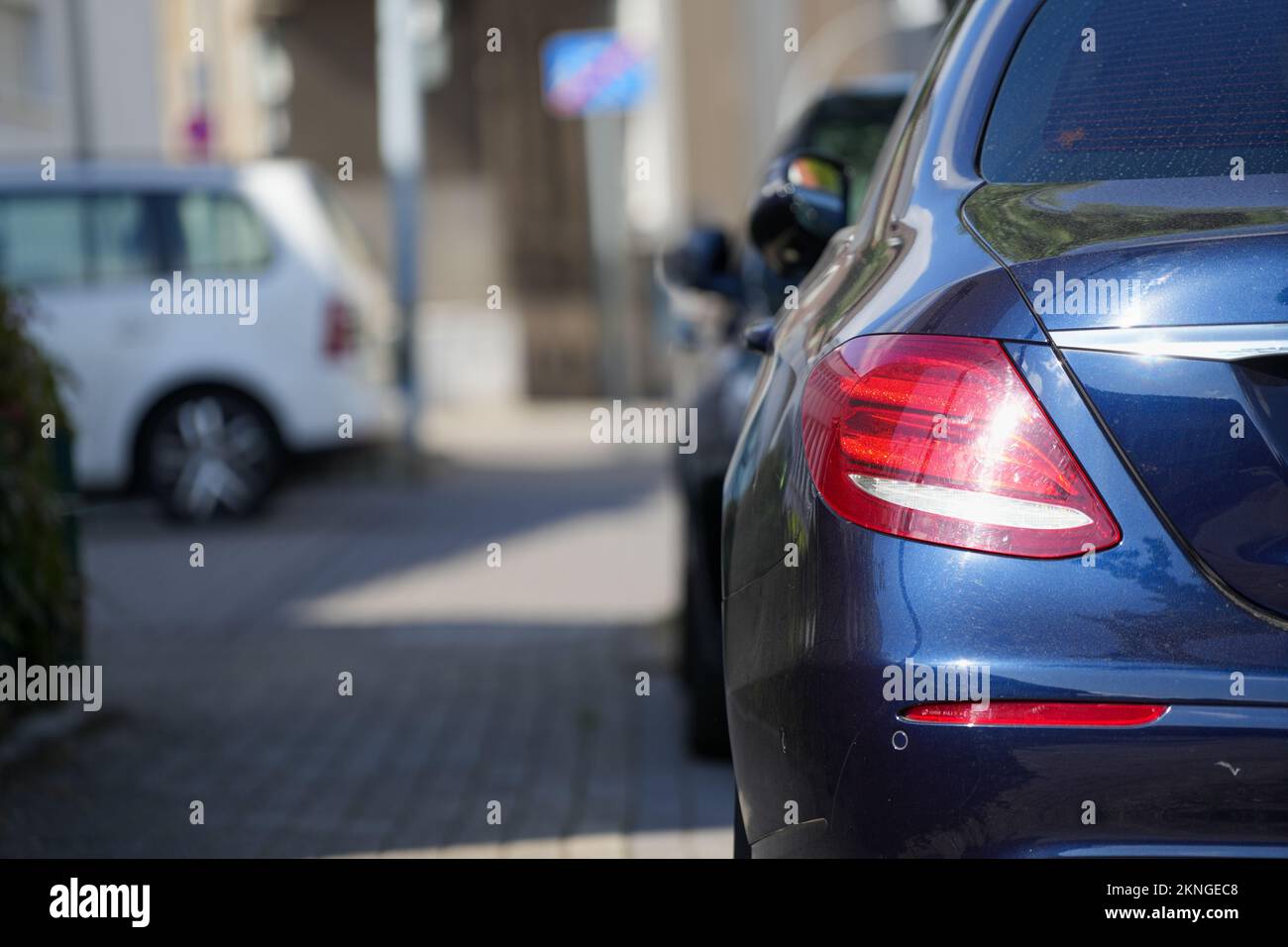A scenic view of the rear headlights of a blue car found parked in an ...