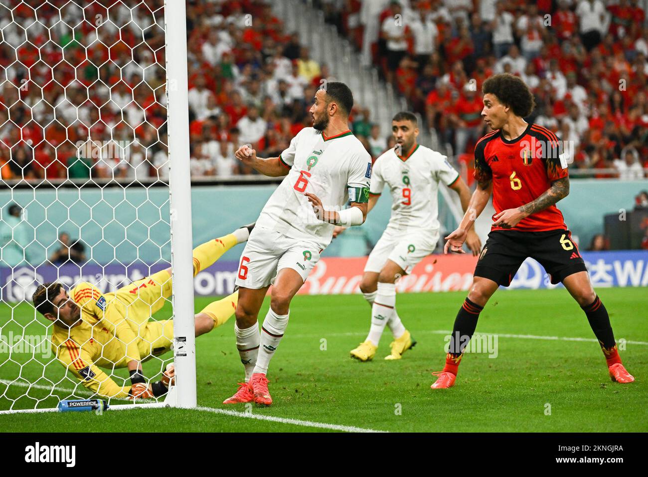 Thibaut Courtois of Belgium and Romain Saiss of Morocco during Belgium ...