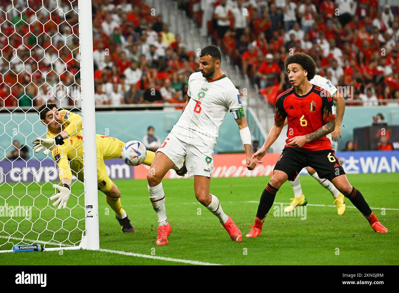 Thibaut Courtois of Belgium and Romain Saiss of Morocco during Belgium ...