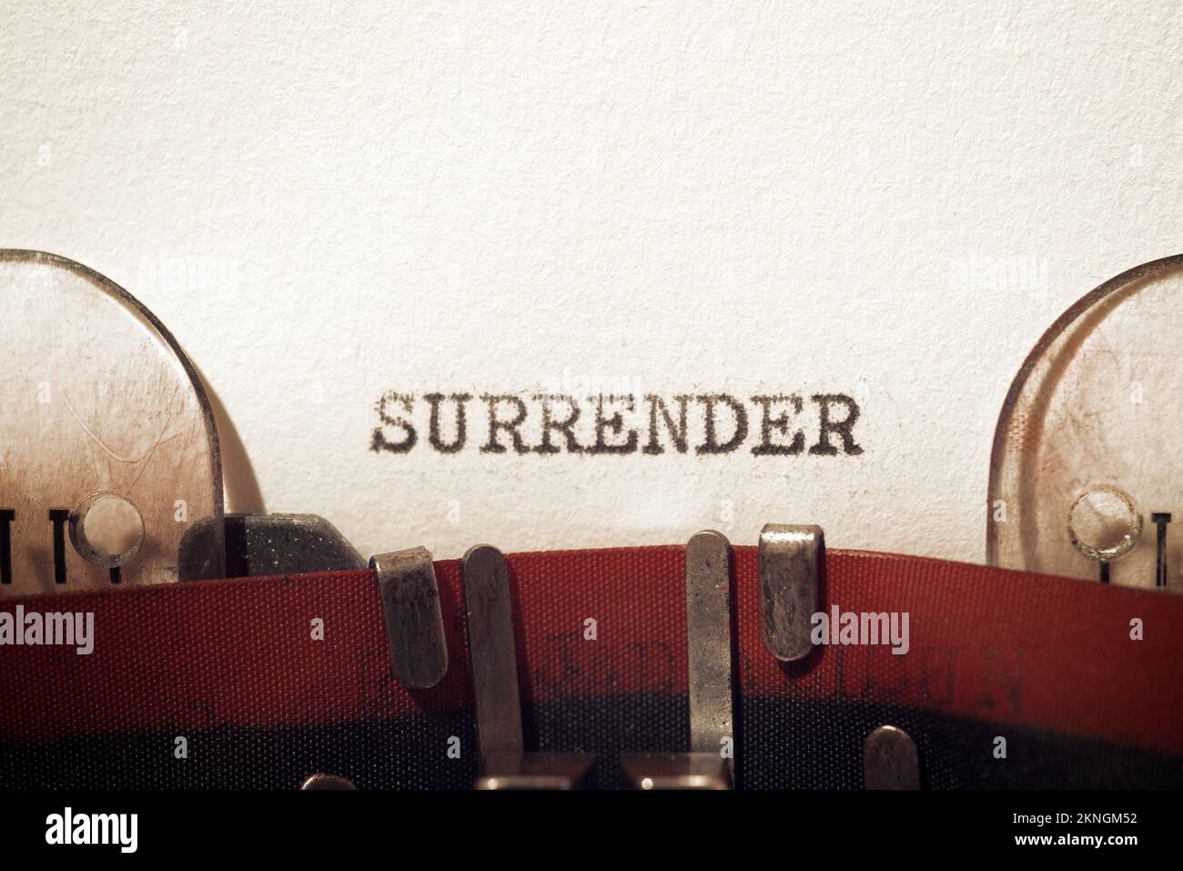 Surrender text written with a typewriter Stock Photo - Alamy