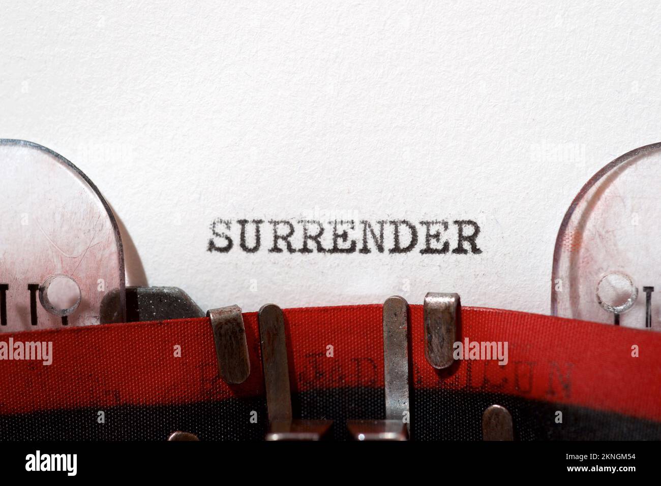 Surrender text written with a typewriter Stock Photo - Alamy