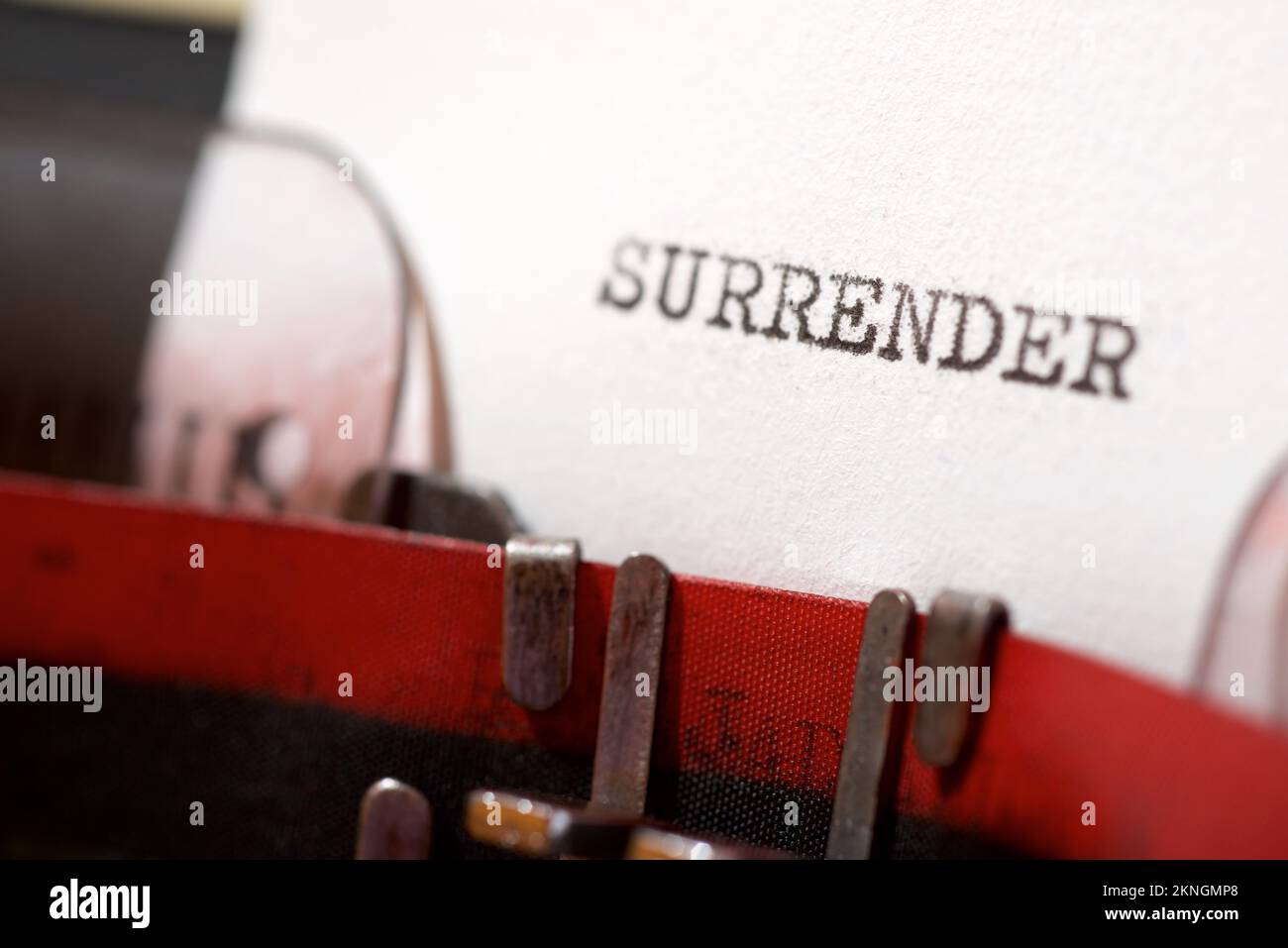 Surrender text written with a typewriter Stock Photo - Alamy