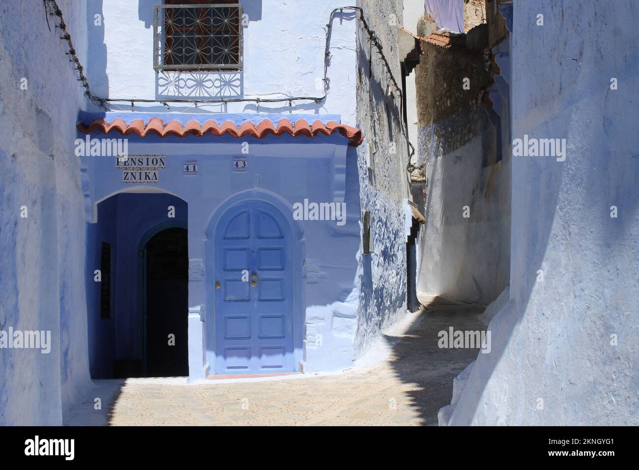 A blue alley in the hill town of Chefchaouen Stock Photo - Alamy