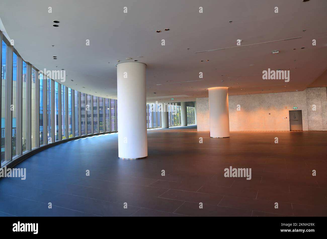 The Illuminated long and clean corridor of modern building, exhibition ...