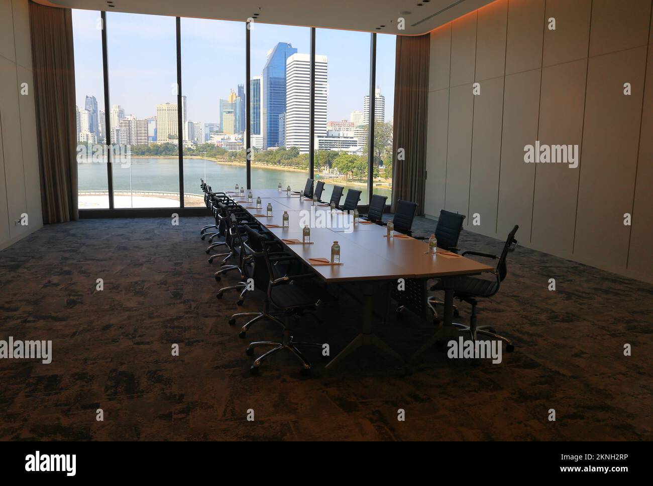 Empty modern boardroom, meeting room or conference room with city view ...