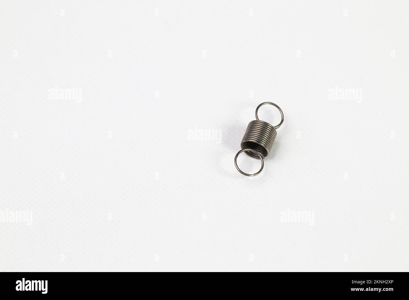 metal tension spring for different purposes, many small chrome springs ...