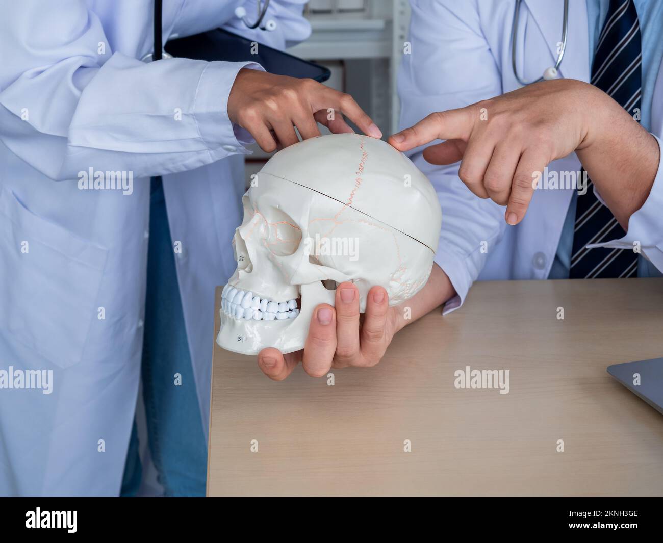 Two doctors in white uniforms talking, working together in medical ...