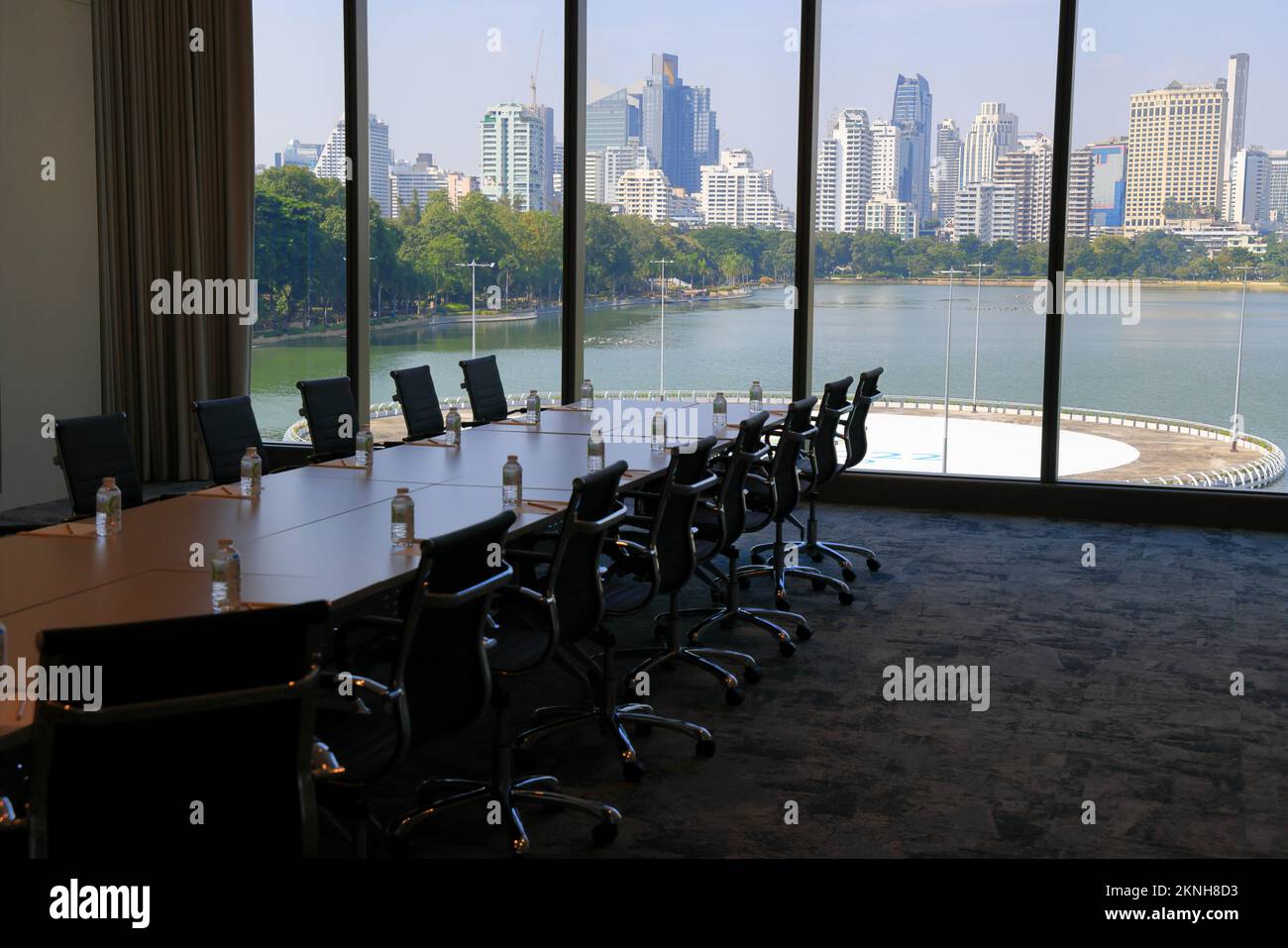 Empty modern boardroom, meeting room or conference room with city view ...