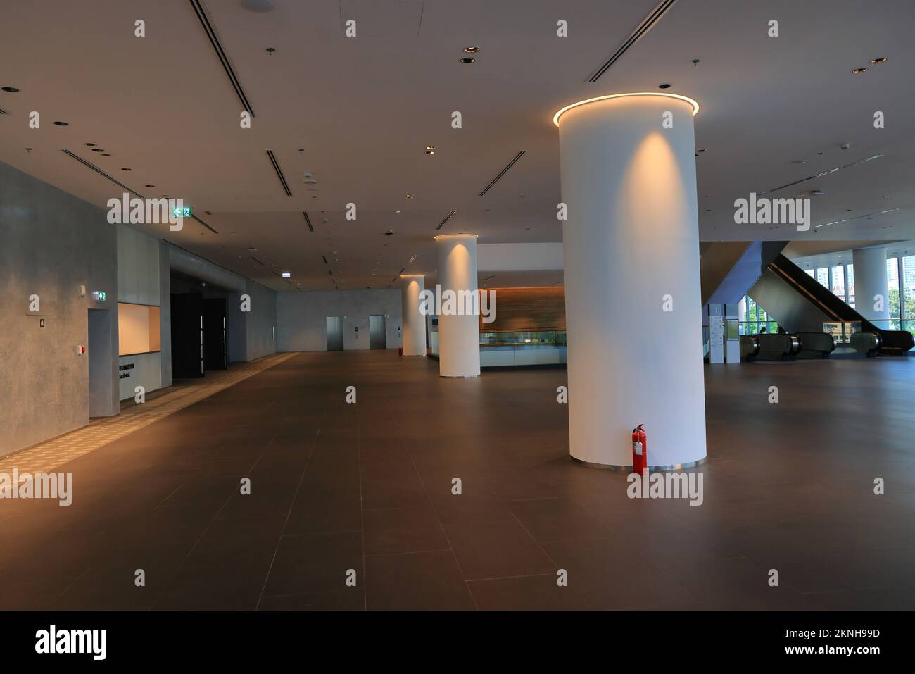 The Illuminated long and clean corridor of modern building, exhibition ...
