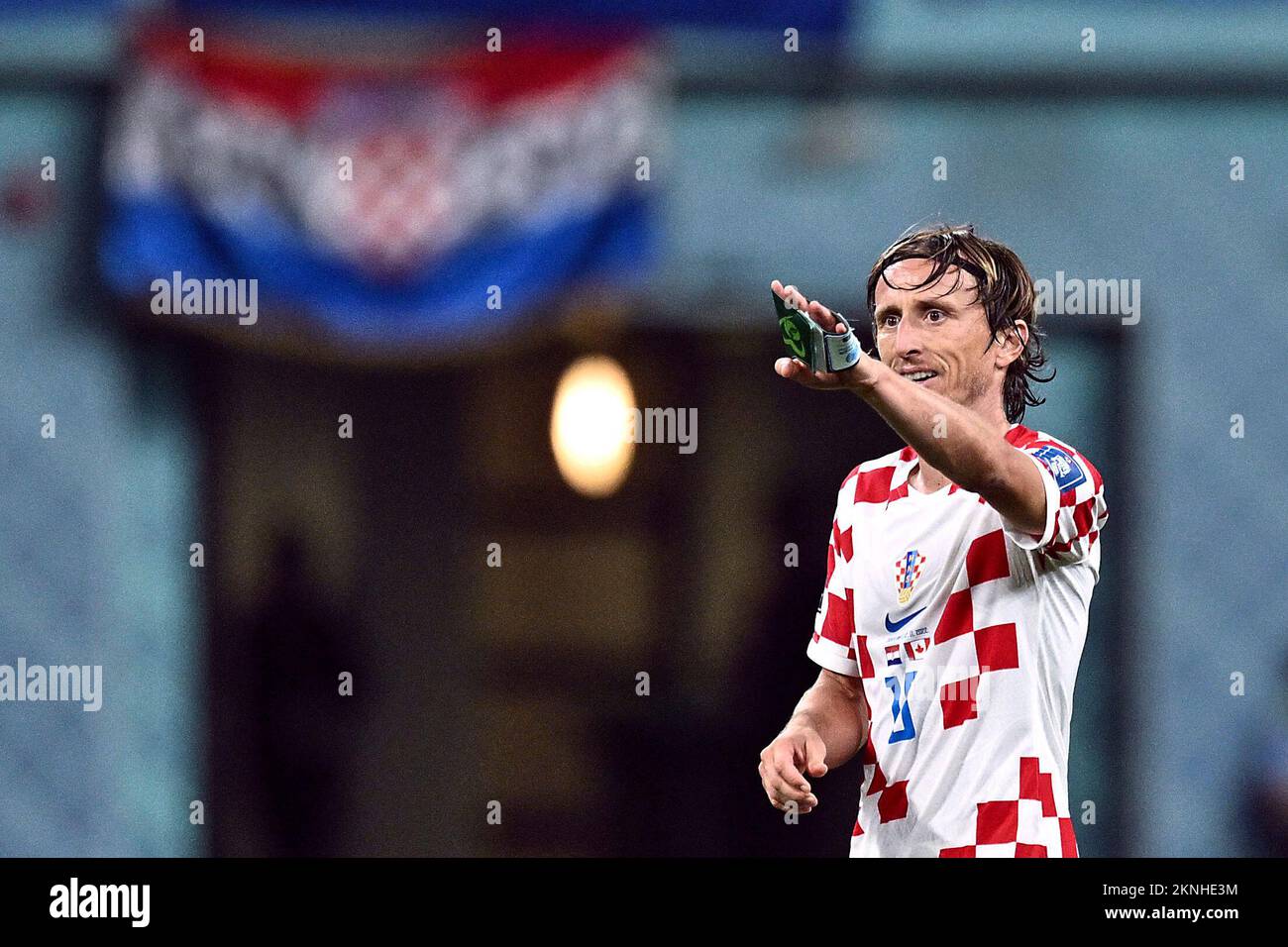 Doha, Qatar. 27th Nov, 2022. Luka Modric of Croatia hands over his band ...