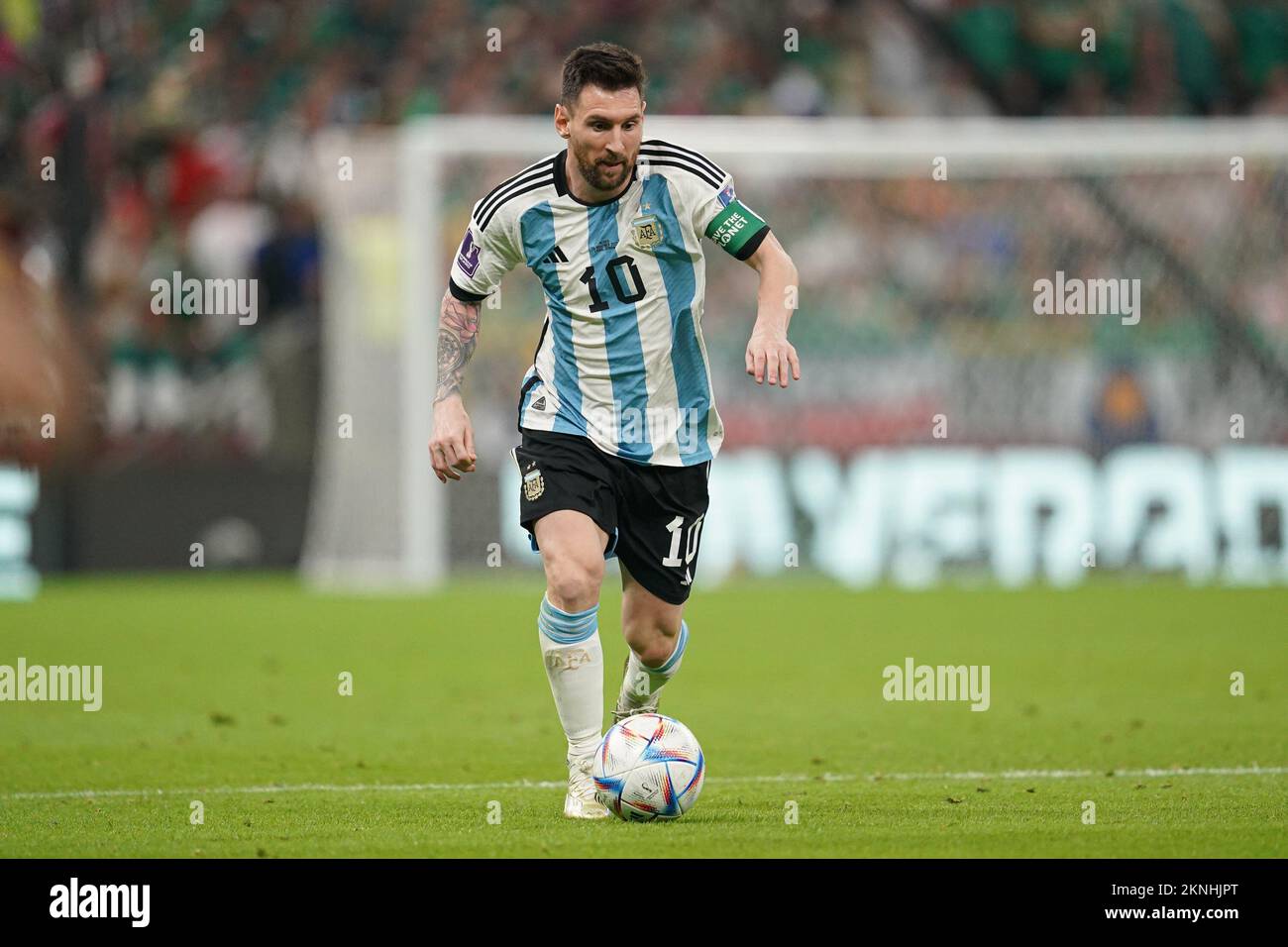 LUSAIL, QATAR - NOVEMBER 26: Player of Argentina Lionel Messi drives ...