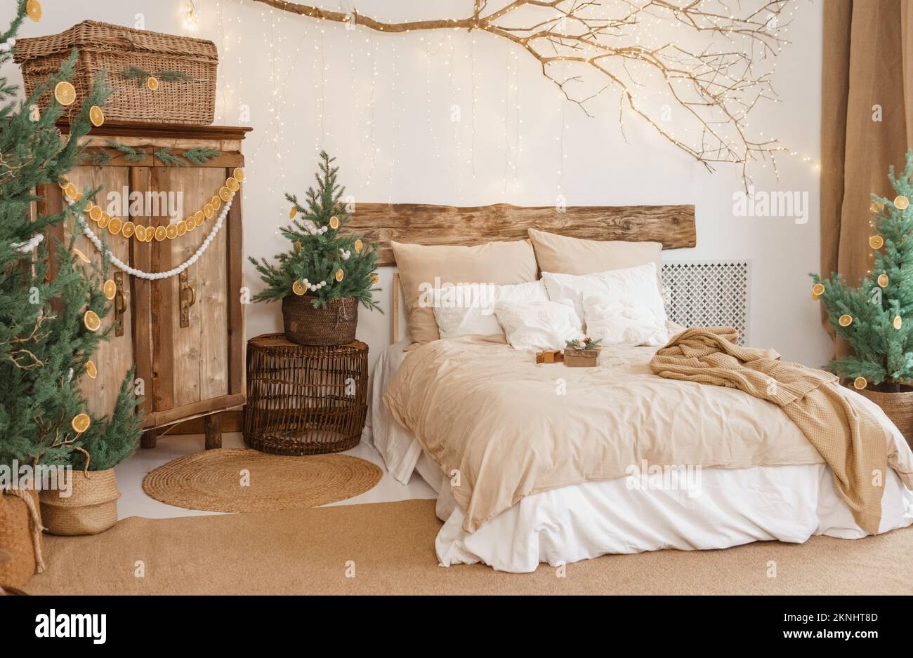 Cozy interior decorated for Christmas in Scandinavian style. Live fir ...