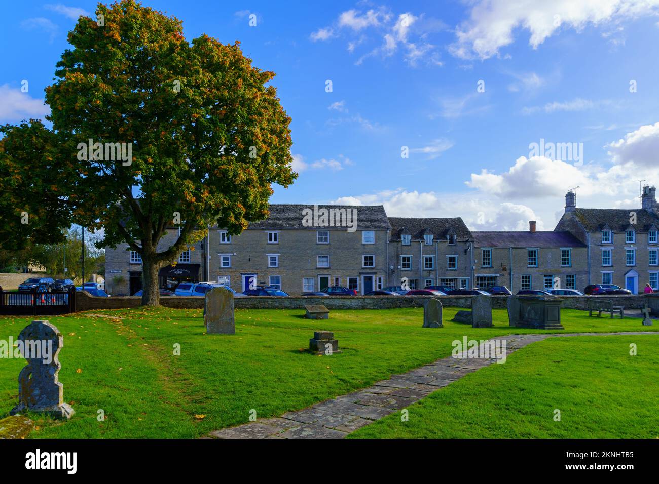 Fairford, UK - October 17, 2022: View of the church cemetery, houses ...