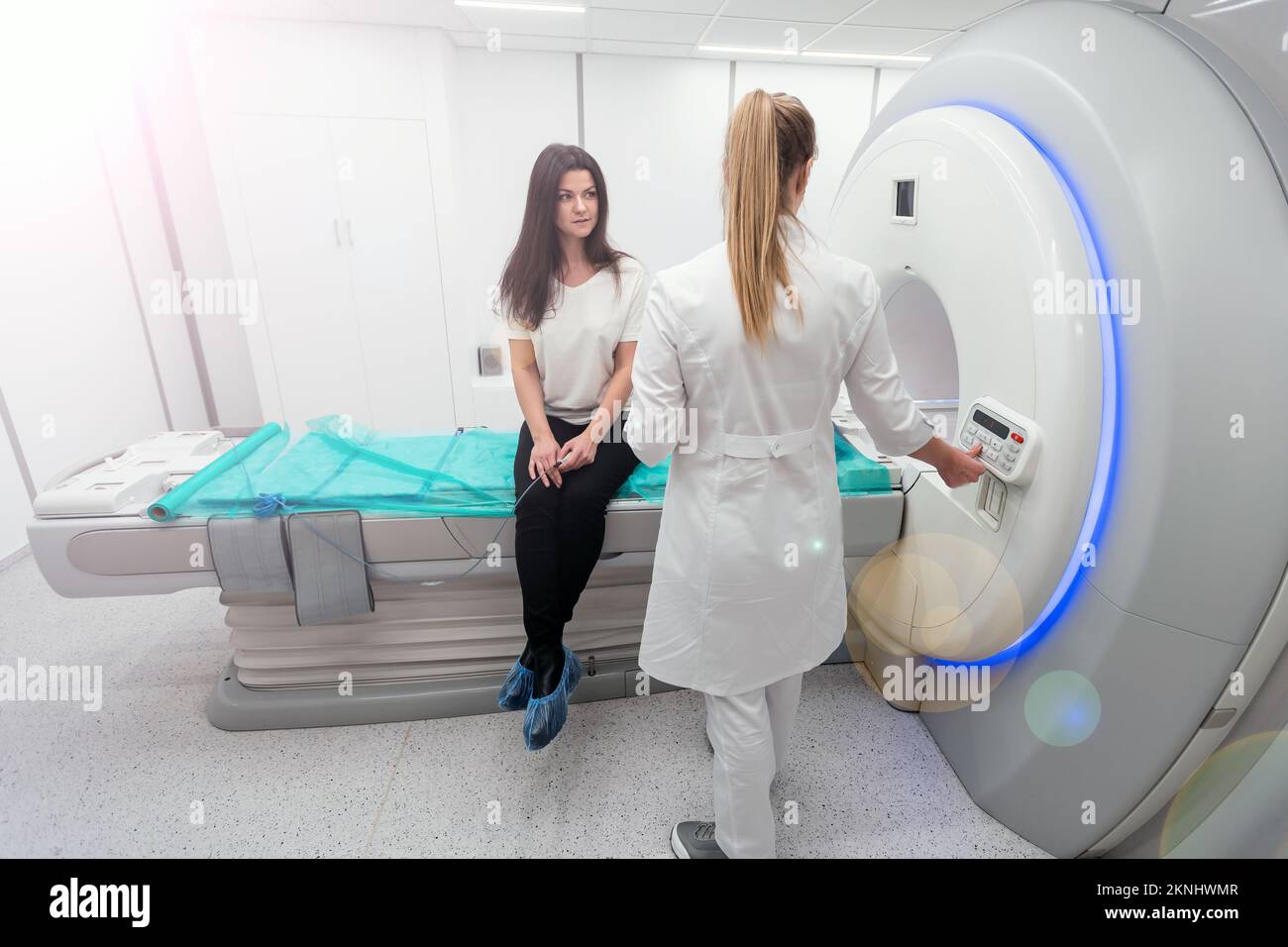 Female patient undergoing MRI - Magnetic resonance imaging in Hospital ...