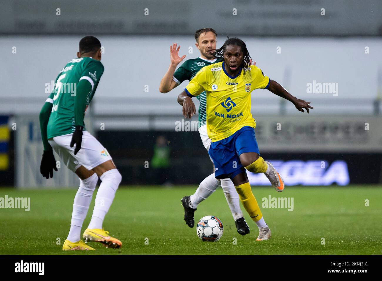Lommel's Robin Henkens and Beveren's Dieumerci Mbokani pictured in ...
