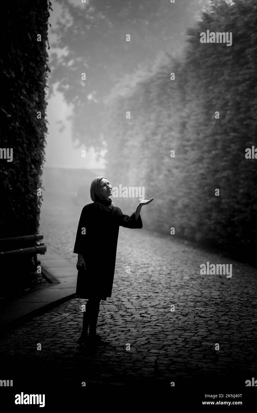 Girl in public garden Black and White Stock Photos & Images - Alamy