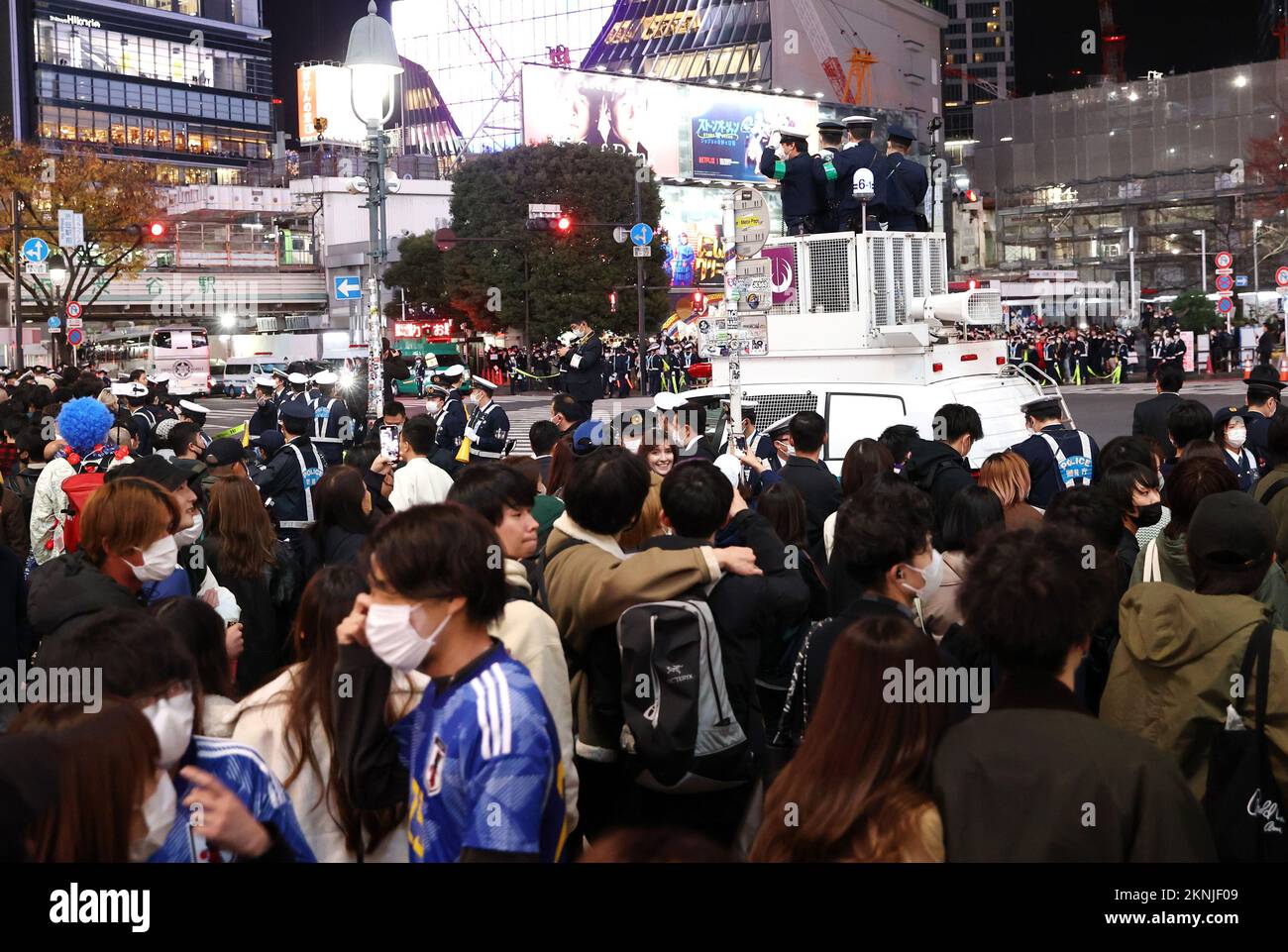 Tokyo, Japan. 27th Nov, 2022. Police officers control Japanese football ...