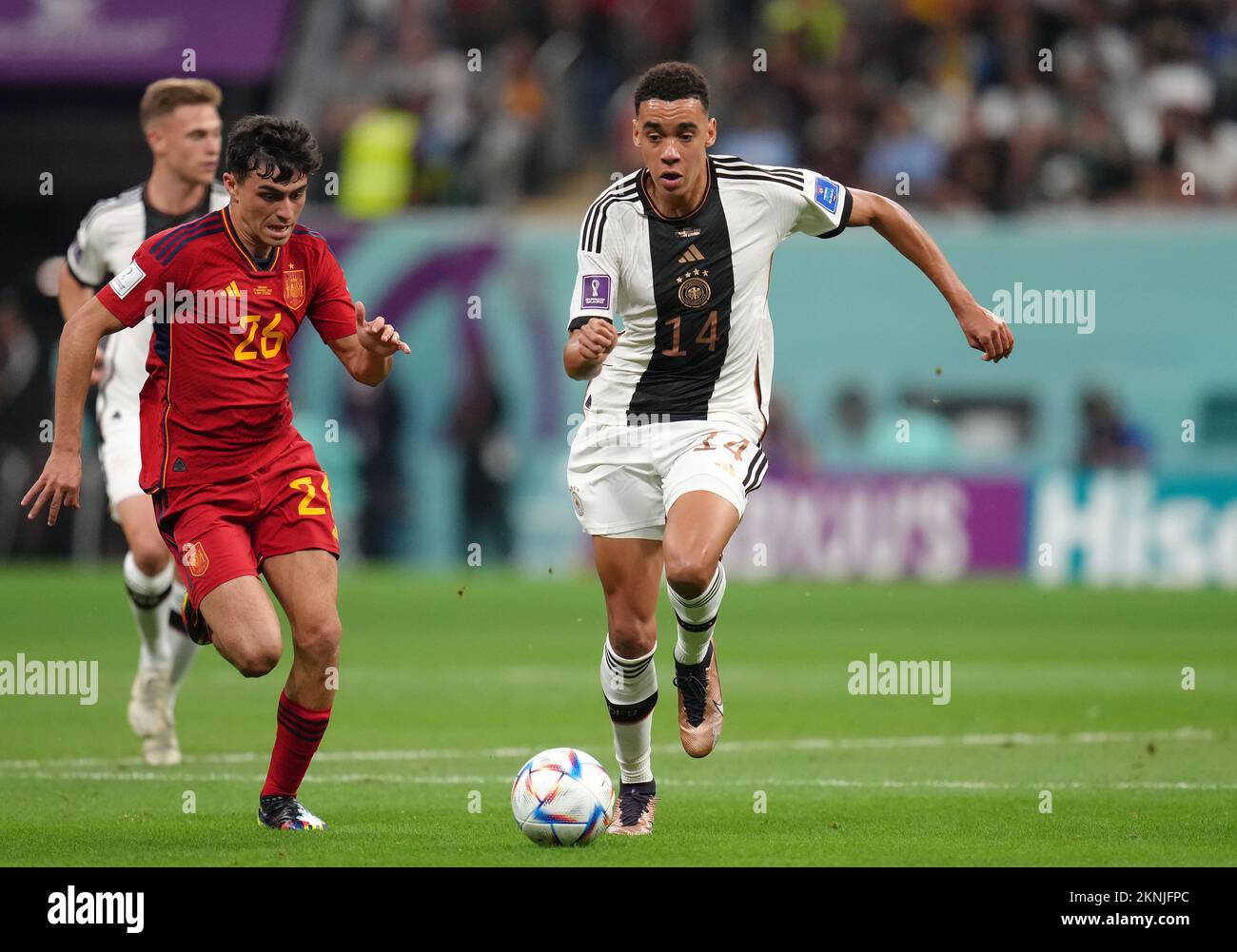Spain's Dani Carvajal (left) and Germany's Jamal Musiala battle for the ...