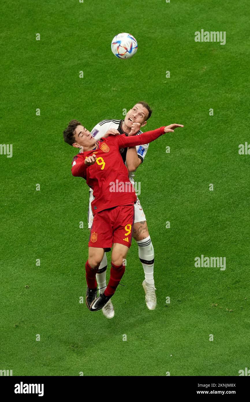 Germany’s David Raum (right) and Spain’s Gavi battle for the ball ...