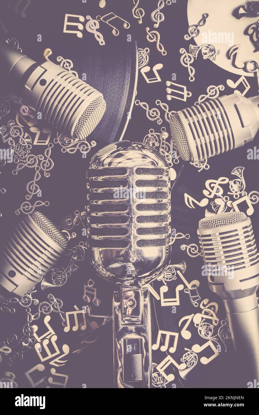 Audio visual song mix with silver microphones and clefs abstracted ...