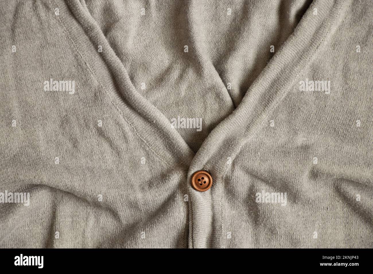 Men's gray stylish jacket with buttons as a background close-up ...