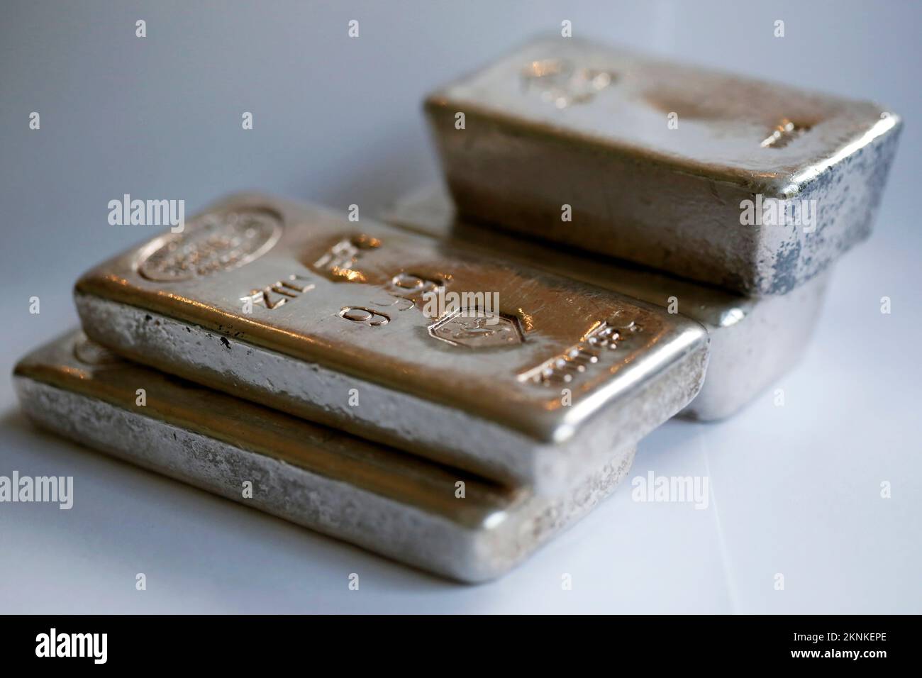 Silver ingots and a grey colored background Stock Photo - Alamy