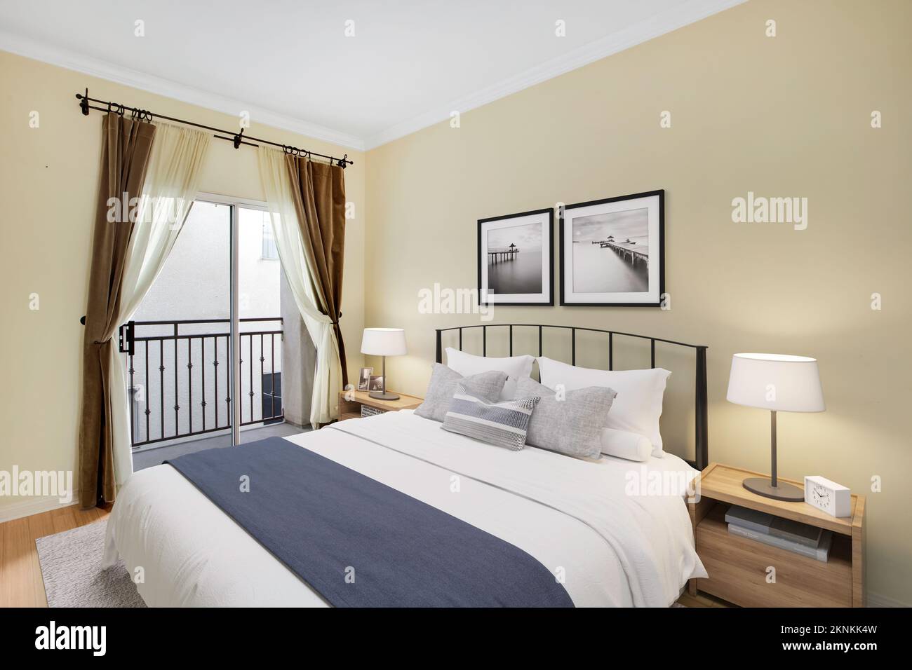 A 3D illustration of a modern bedroom design with creamy walls, white ...