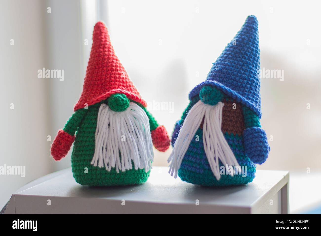 Two funny knitted Santa Claus. Christmas handmade gift. Cute dwarf with ...