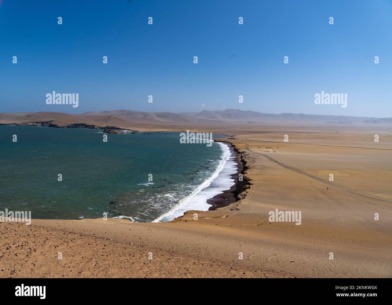 A beautiful shot of a red sand beach in the Paracas National Park, Peru ...