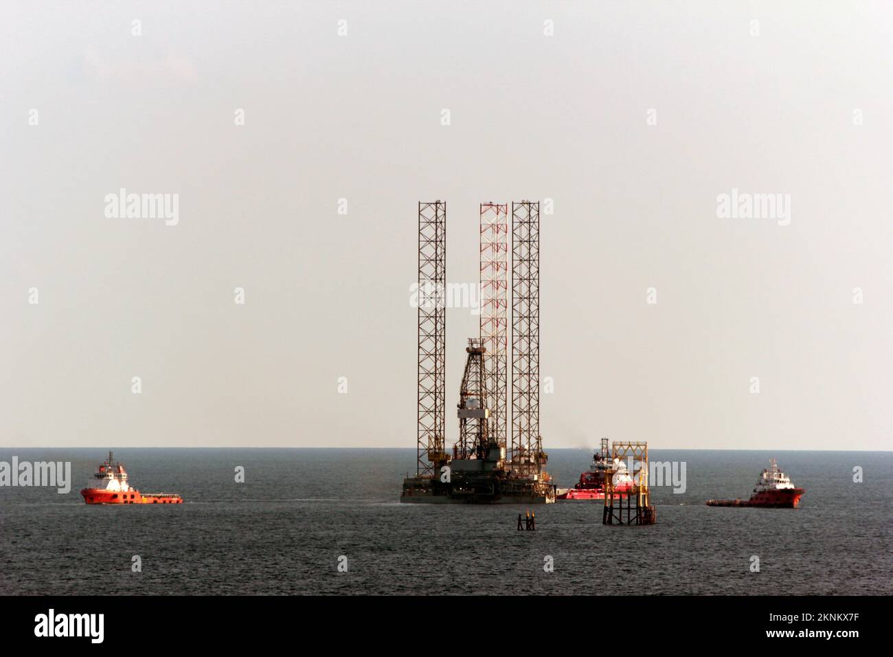 Tug boats positioning a jack up rig, South China Sea, Malaysia Stock ...