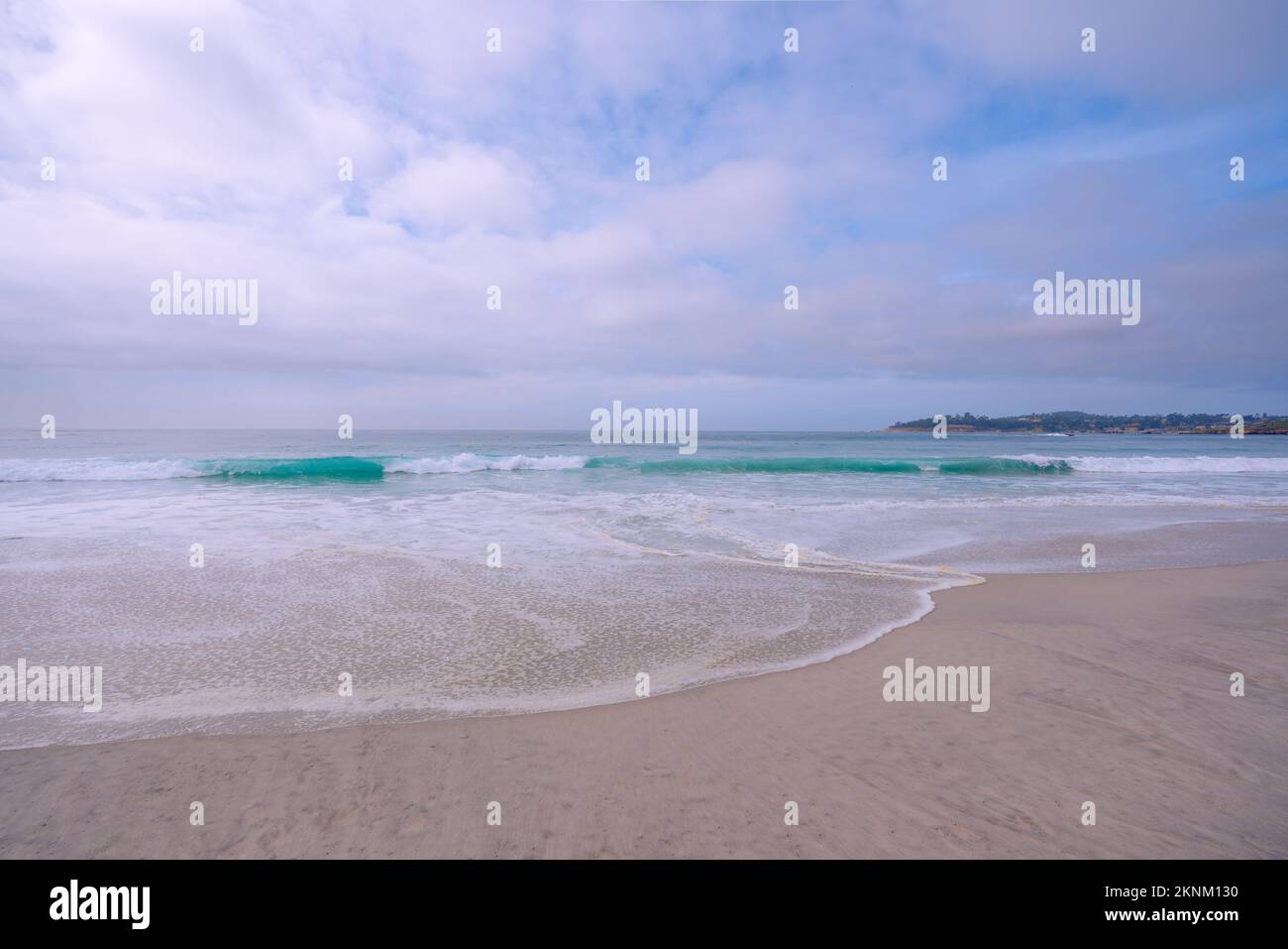Light airly seascape in blue and pink colors. Wide sandy beach, sea ...