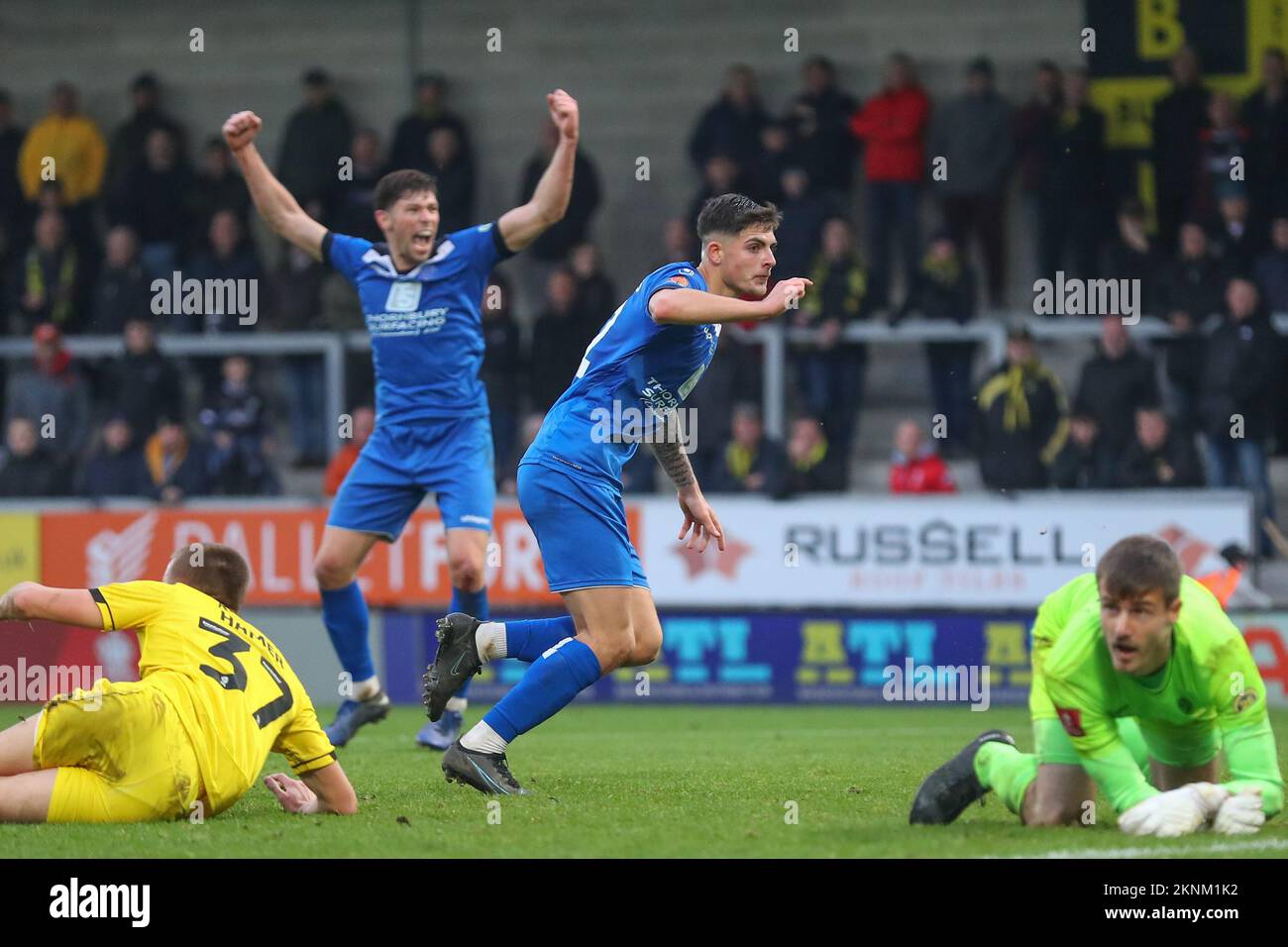 Harry Parsons #12 of Chippenham Town celebrates his goal to make it 3-1 ...