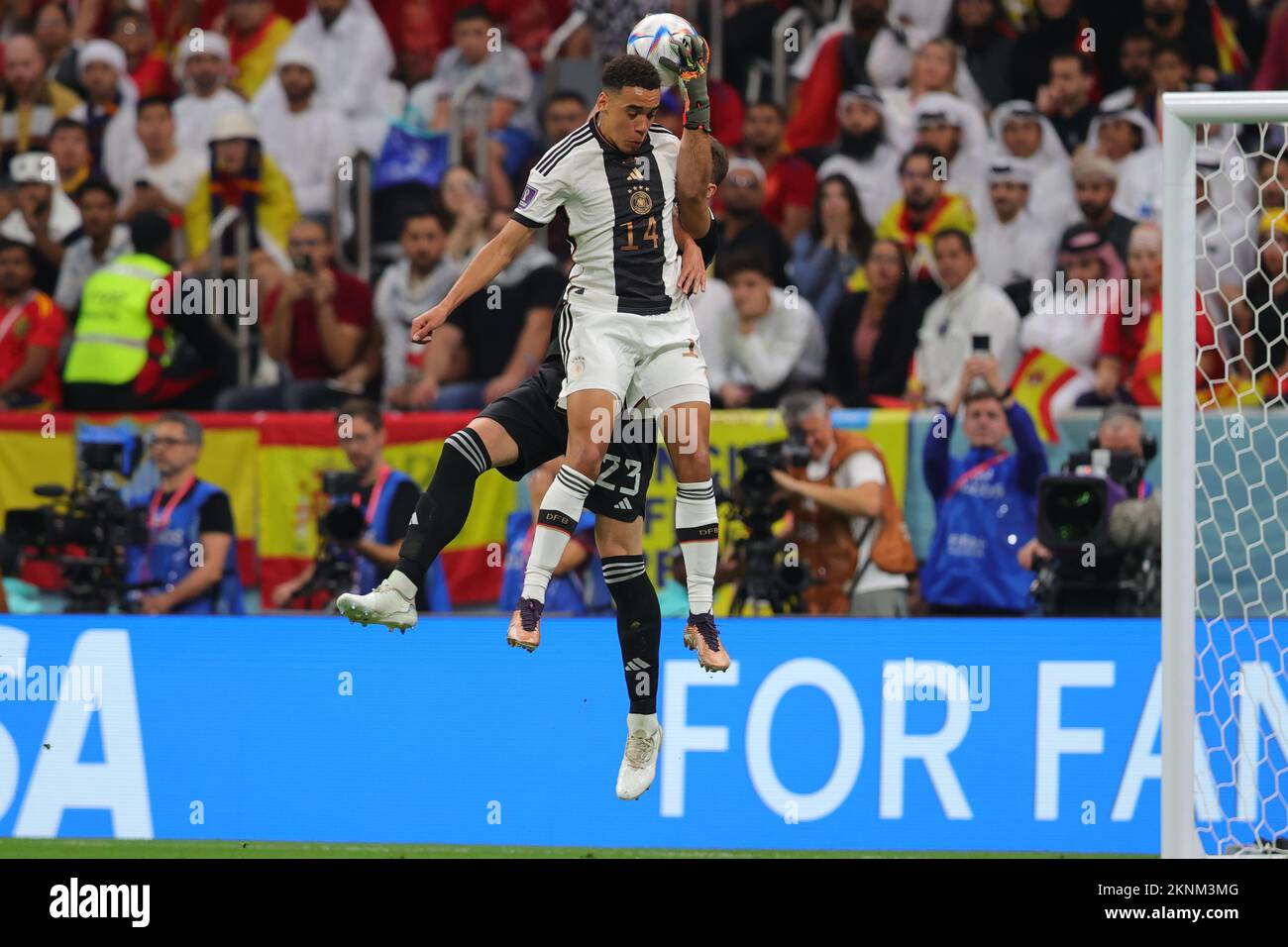 Al Khor, Qatar. 27th Nov, 2022. Unai Simon of Spain and Jamal Musiala ...